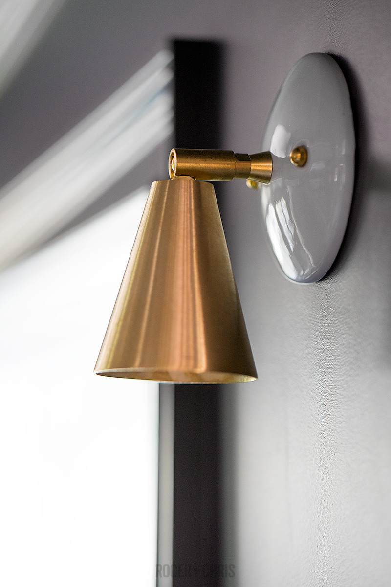 Hardwired Dodger art sconce with white porcelain backplate | Roger + Chris